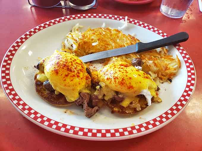 Eggs Benedict arrives looking picture-perfect, hollandaise cascading over poached eggs like a breakfast waterfall of deliciousness.