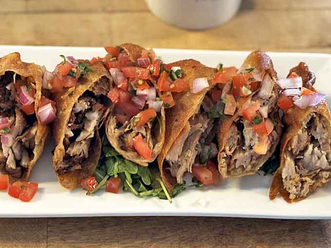 These aren't your average egg rolls! Crispy wrappers stuffed with smoky pulled pork – breakfast fusion that somehow makes perfect sense.