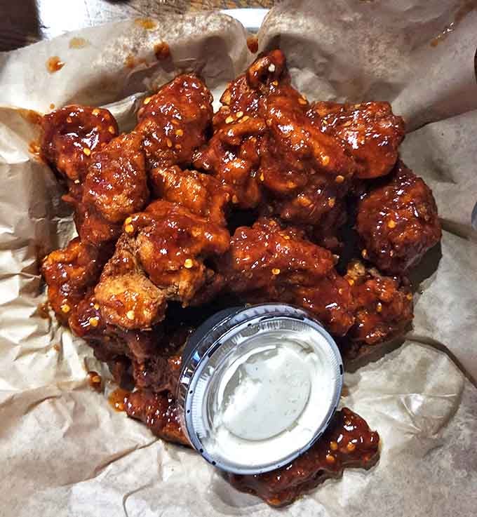 These buffalo wings aren't just spicy &ndash; they're the kind of flavor bomb that makes you wonder if the kitchen has somehow bottled joy and coated each morsel.