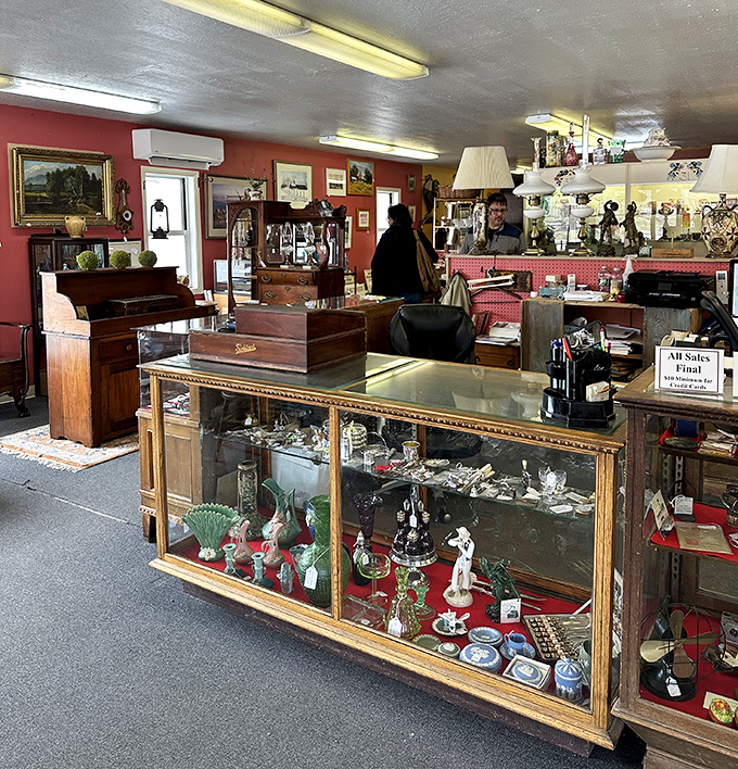 The front counter where dreams and credit cards meet their destiny. Behind that glass case lies temptation in a thousand tiny forms.