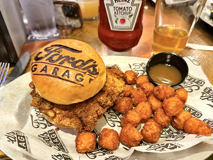 This chicken sandwich brings new meaning to "comfort food," nestled alongside golden tater tots that crunch like autumn leaves underfoot.