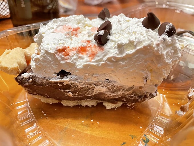 A slice of heaven that combines layers of chocolate, cream, and whatever magic they sprinkle in the kitchen to make adults giggle with delight.