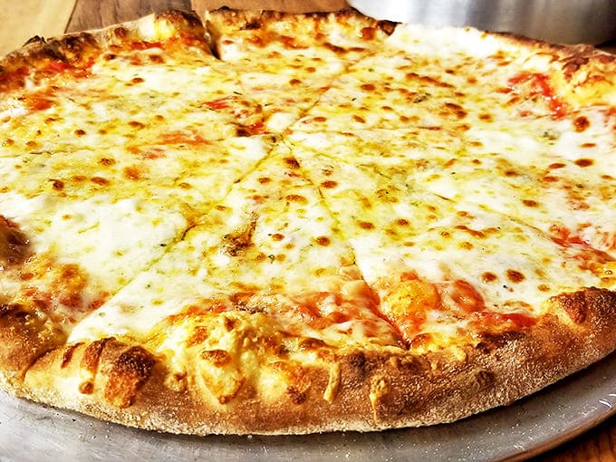 Classic cheese pizza: Simplicity perfected &ndash; a golden-brown crust with bubbling mozzarella that stretches for days. Sometimes the classics become classics for good reason.