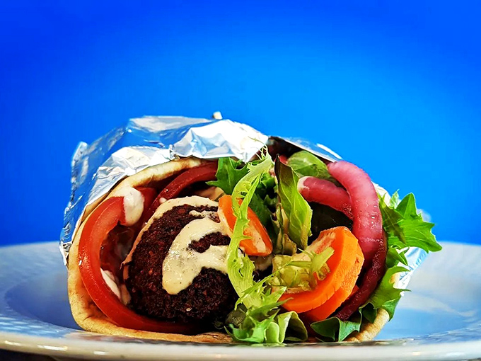 Every bite offers a different flavor adventure &ndash; from the crunch of fresh vegetables to the creamy hummus that ties everything together.