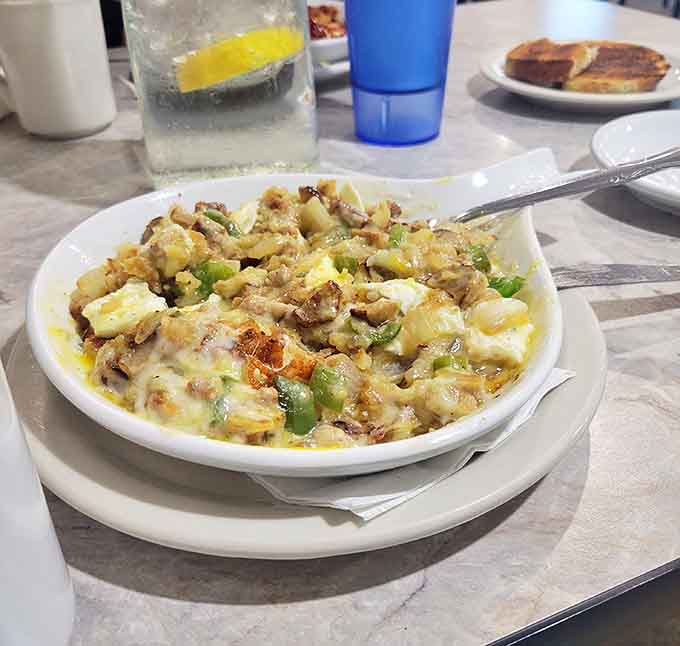 The avocado skillet brings California dreams to Midwest tables, with creamy green goodness complementing those perfectly cooked eggs.