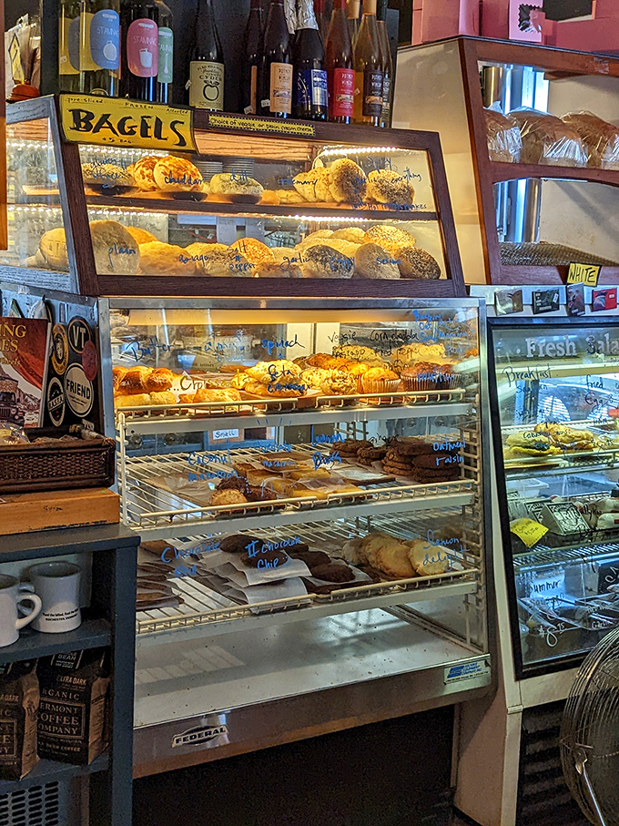 A treasure trove of baked delights awaits behind glass, from plump bagels to decadent cookies, each handcrafted with the care of a beloved recipe.