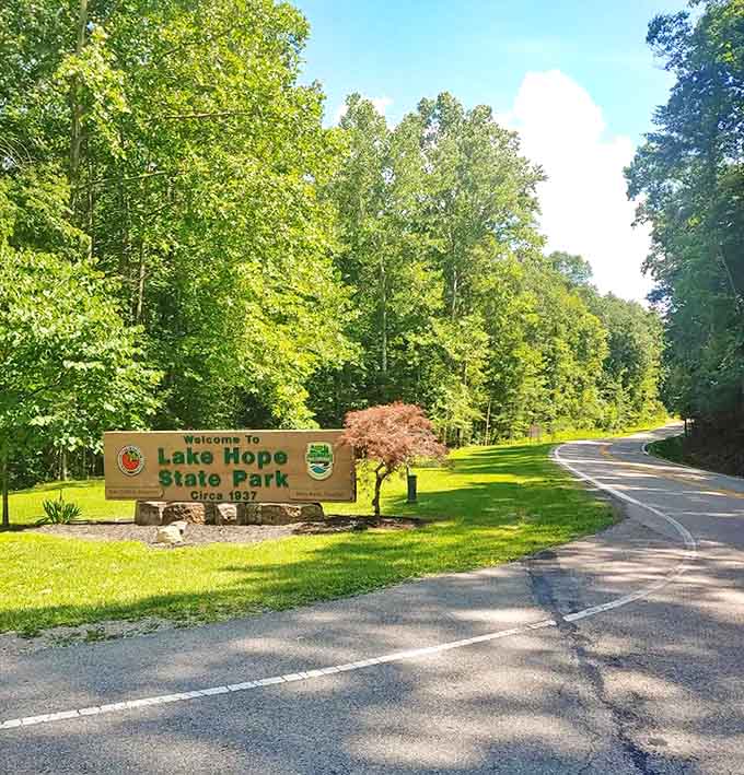 The welcoming entrance sign to Lake Hope State Park &ndash; where cell service fades but life's signal strengthens considerably.