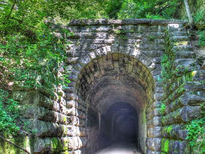 The Sand Cave Trail welcomes young adventurers with a well-marked path that promises geological wonders and memory-making moments ahead.