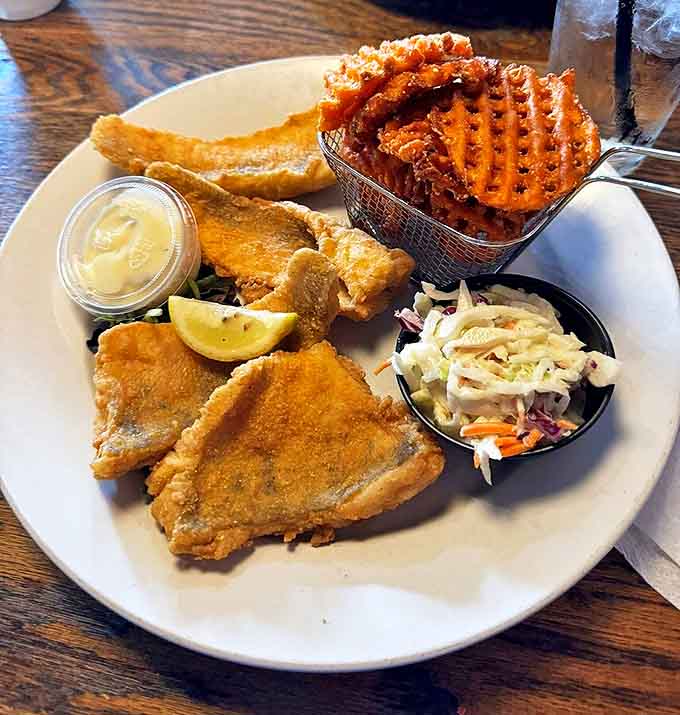 Golden-battered whitefish nestled alongside hand-cut fries &ndash; a delicious reminder that Great Lakes seafood rivals anything from the coasts.