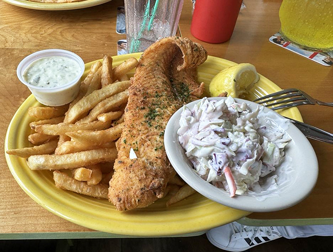 A symphony of textures &ndash; crispy fish, fluffy fries, and creamy coleslaw create the perfect bite every time, proving that classics become classics for good reason.
