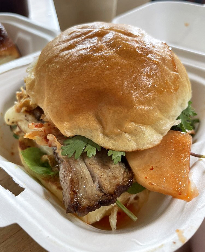 Kimchi and pork belly join forces in this breakfast rebel that proves international relations are best conducted between two pieces of bread.