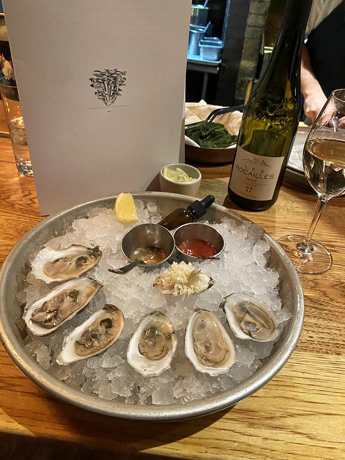 Fresh oysters nestled in ice, accompanied by a crisp white wine – the ocean and vineyard conspiring to create your perfect evening.