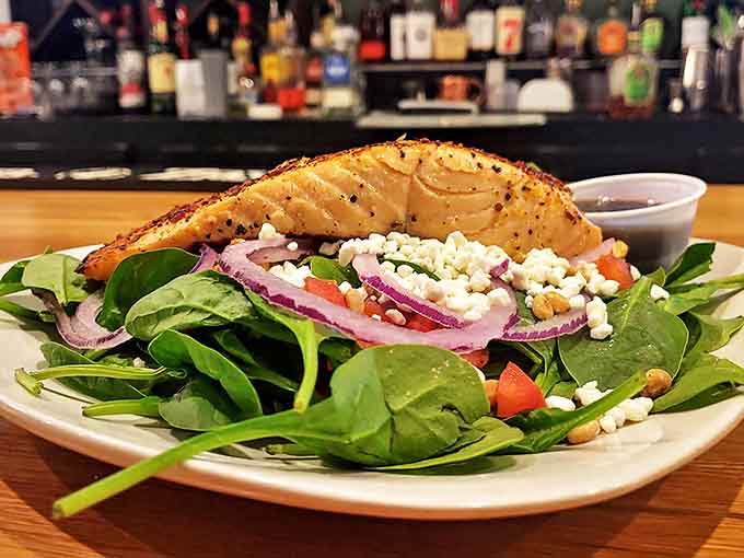 Perfectly seared salmon atop fresh spinach proves that "healthy option" doesn't have to mean "flavor sacrifice" at this thoughtful eatery.