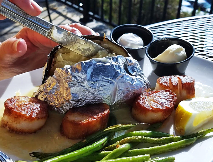 Behold, the crown jewels of the sea! These seared scallops are like butter-soft pillows of oceanic bliss, nestled in a citrusy dream sauce.