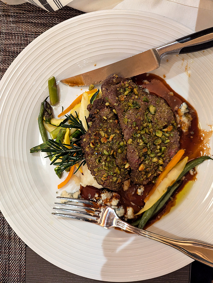The pistachio-crusted venison tells Vermont's story in every bite – wild, refined, and utterly unforgettable.