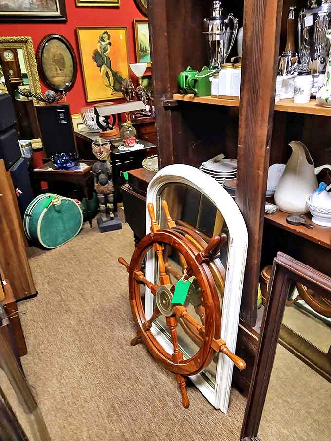 A nautical treasure emerges! This vintage ship's wheel would transform any room from "nice home" to "fascinating sea captain's quarters" in one bold installation.