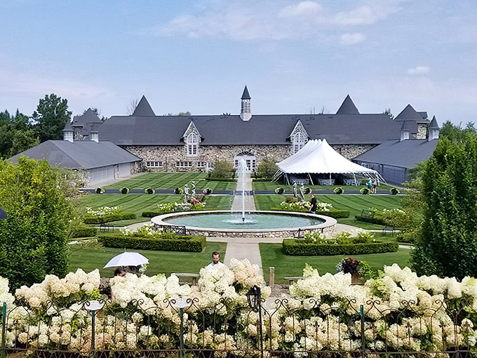 Castle Farms' stunning gardens and fountain create a picture-perfect foreground for the impressive stone buildings beyond.