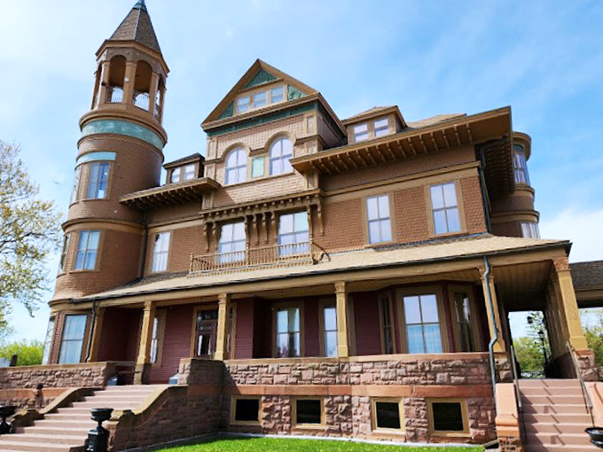 Turrets and tales galore! This 42-room wonder has more stories than a bookstore and enough charm to make Mary Poppins jealous.