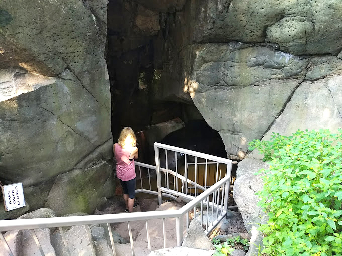 Who needs a skylight when you've got this? Nature's own sunroof offers a glimpse of blue skies from deep within the rock. 