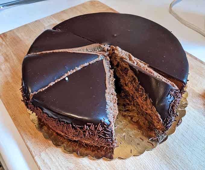 This chocolate mousse cake with its mirror-smooth ganache could make a grown person weep with anticipation and joy.
