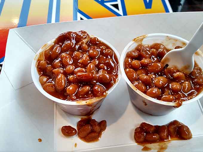 Baked beans swimming in sauce might seem simple, but when they're done right like this, they're the supporting actor that steals the scene.