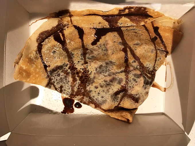 Banana Nutella Crepe: The dessert equivalent of a warm hug &ndash; tender banana slices nestled in melty Nutella, all wrapped in a delicate crepe blanket.