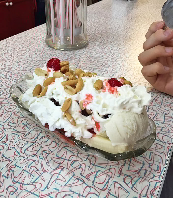 Banana Split: The architectural marvel of desserts&mdash;three scoops, one banana, and enough toppings to make your dentist weep.