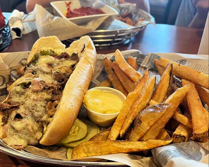 That Philly cheesesteak paired with those legendary fries creates a lunch combination that dreams are made of.