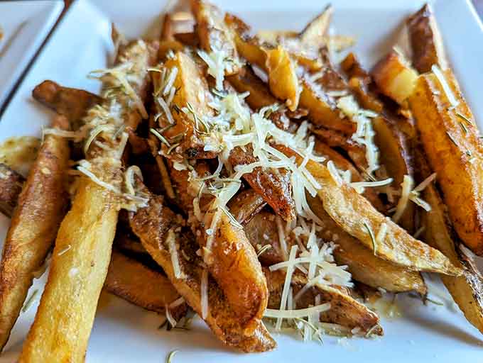 Rosemary fries dusted with cheese transform humble potatoes into crispy, herby sticks of pure addictive deliciousness.