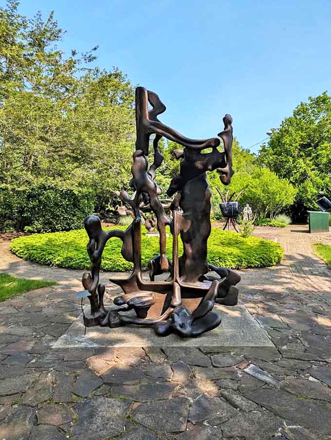 This biomorphic bronze sculpture seems alive with movement, as if strange creatures from the deep had frozen mid-dance.