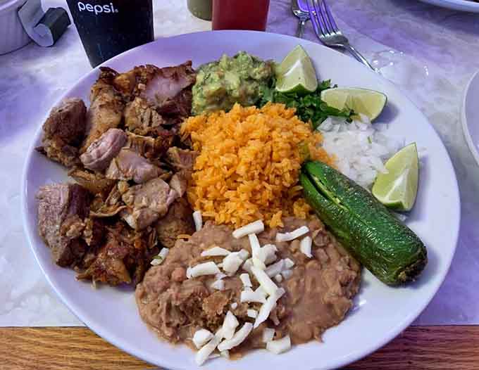 Carnitas so tender they practically melt, served with all the fixings that make Mexican food sing with flavor.
