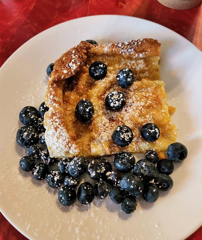 Golden Finnish pancakes dotted with fresh blueberries and dusted with powdered sugar make mornings worth waking up for every single time.