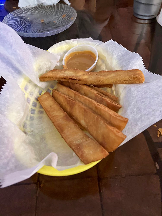 These aren't your average breadsticks &ndash; they're hand-rolled flavor vessels waiting to be dipped in that legendary sauce.
