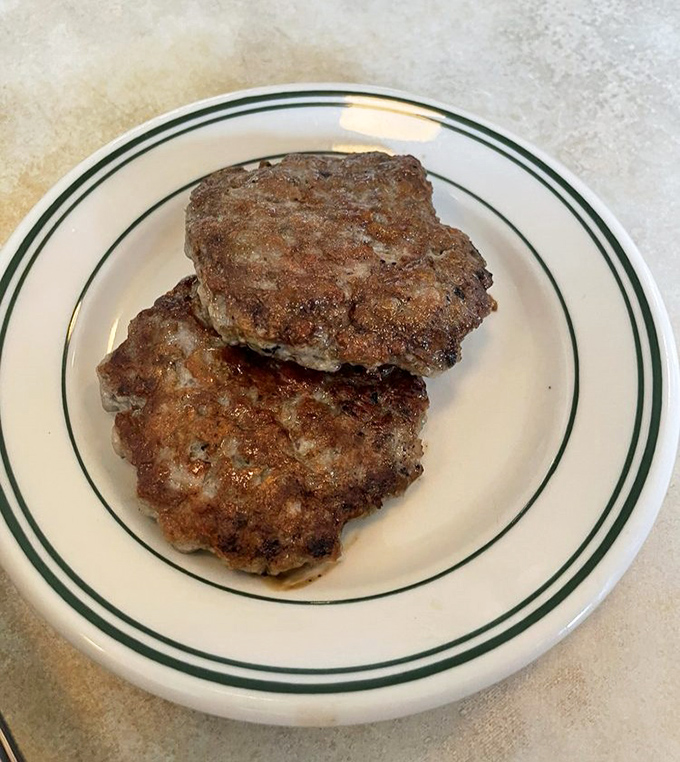 These aren't just any breakfast patties – they're the supporting actors that steal the scene with perfect seasoning and a crisp exterior.