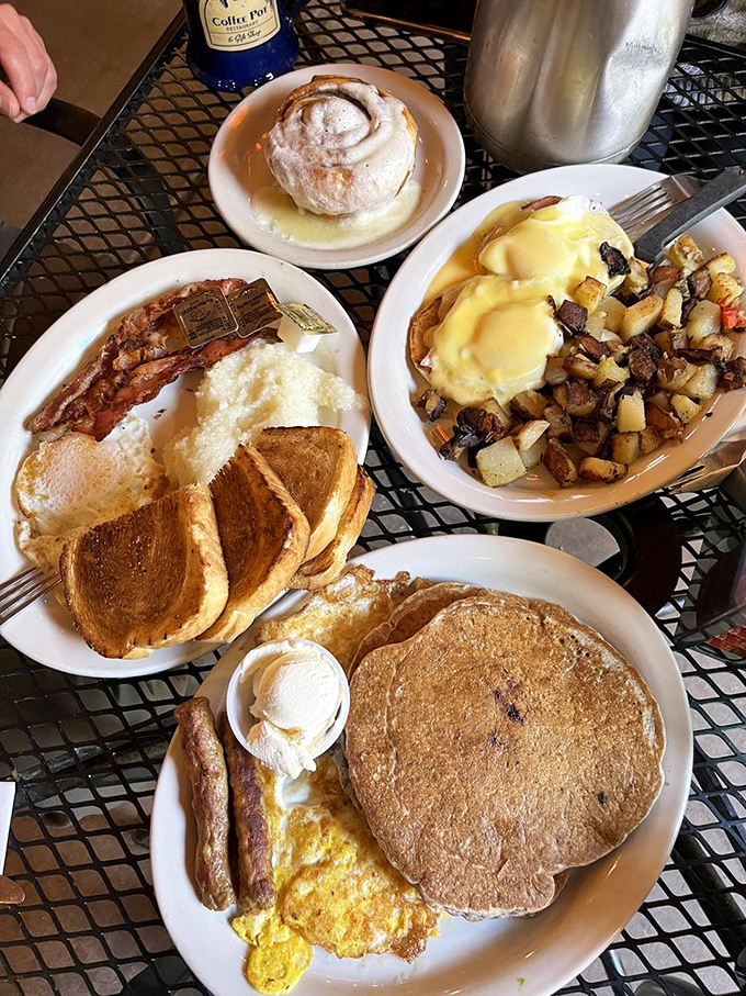 The breakfast spread of dreams &ndash; eggs, pancakes, sausage, and potatoes create a morning symphony that hits all the right notes.