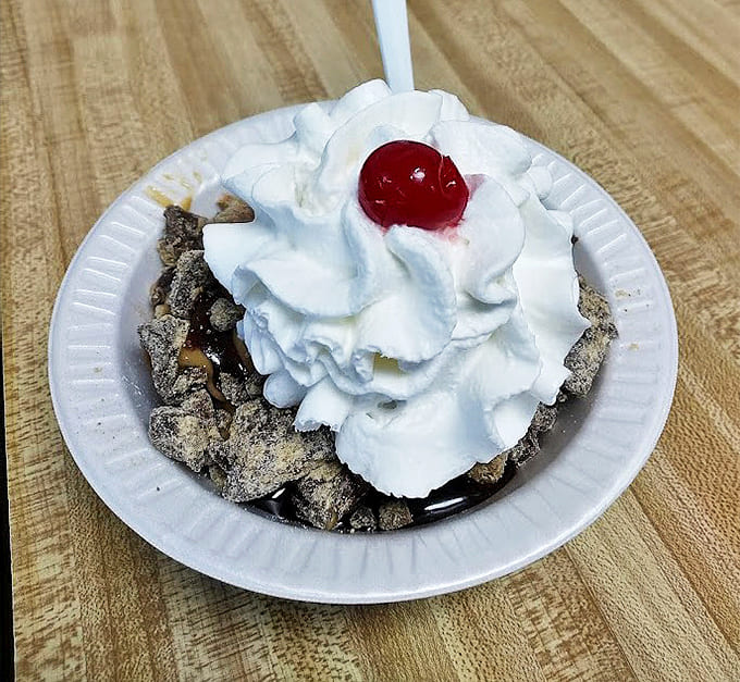 The brownie sundae &ndash; where warm meets cold in a dance of textures that makes spoons move faster than Florida thunderstorms.