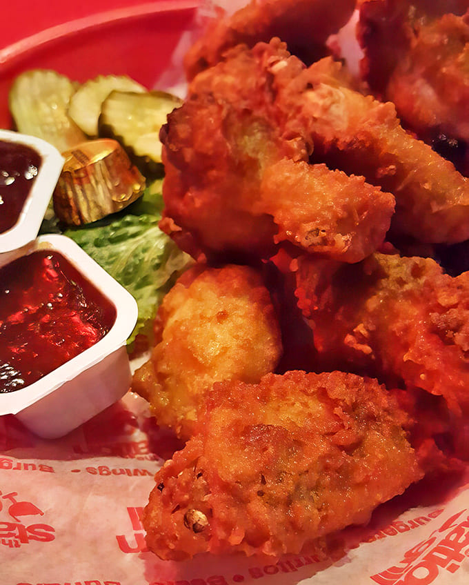 Buffalo Wings: Crispy on the outside, juicy within, these wings deliver a perfect heat-to-tang ratio that makes napkins an endangered species.