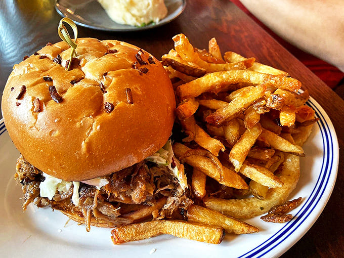 Sink your teeth into a juicy burger piled high with toppings and served with a side of perfectly golden fries.