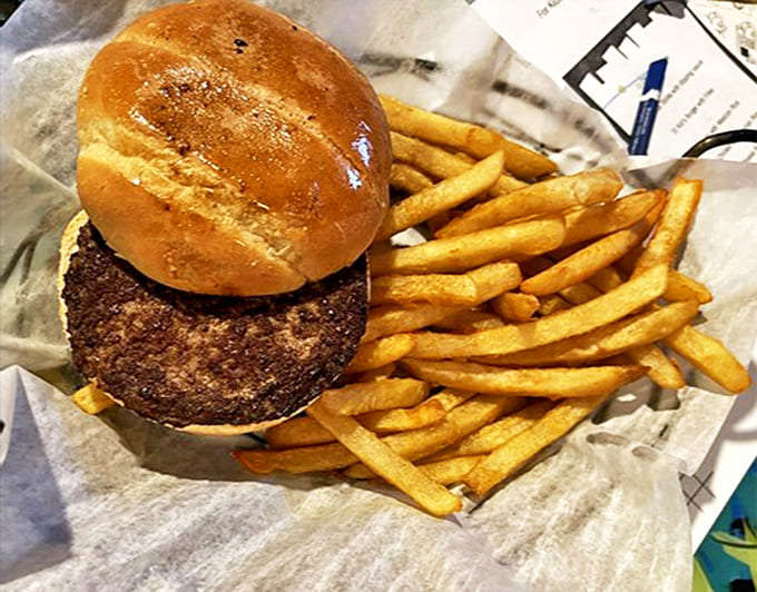 Burger with Fries: Even their American offerings get the Mango's treatment &ndash; a juicy patty on a pillowy bun with golden fries that could convert any taco lover.