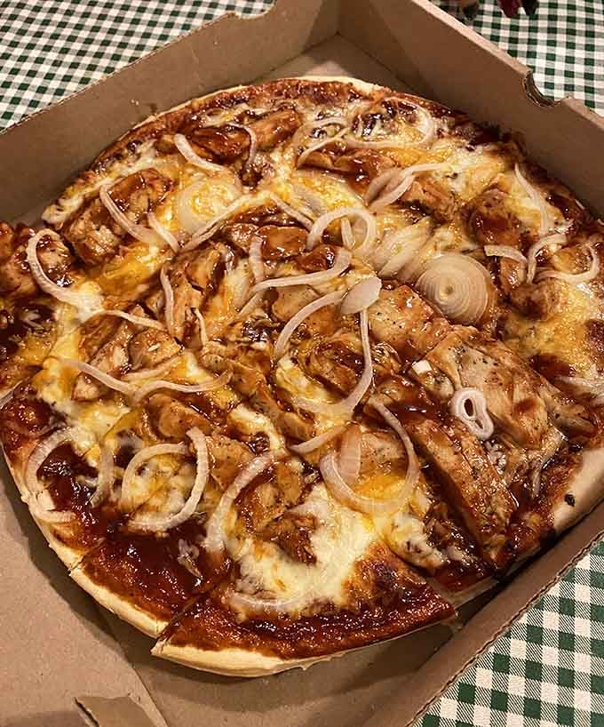 BBQ chicken pizza with those caramelized onions shows that Capuano's isn't afraid to think outside the traditional pizza box.