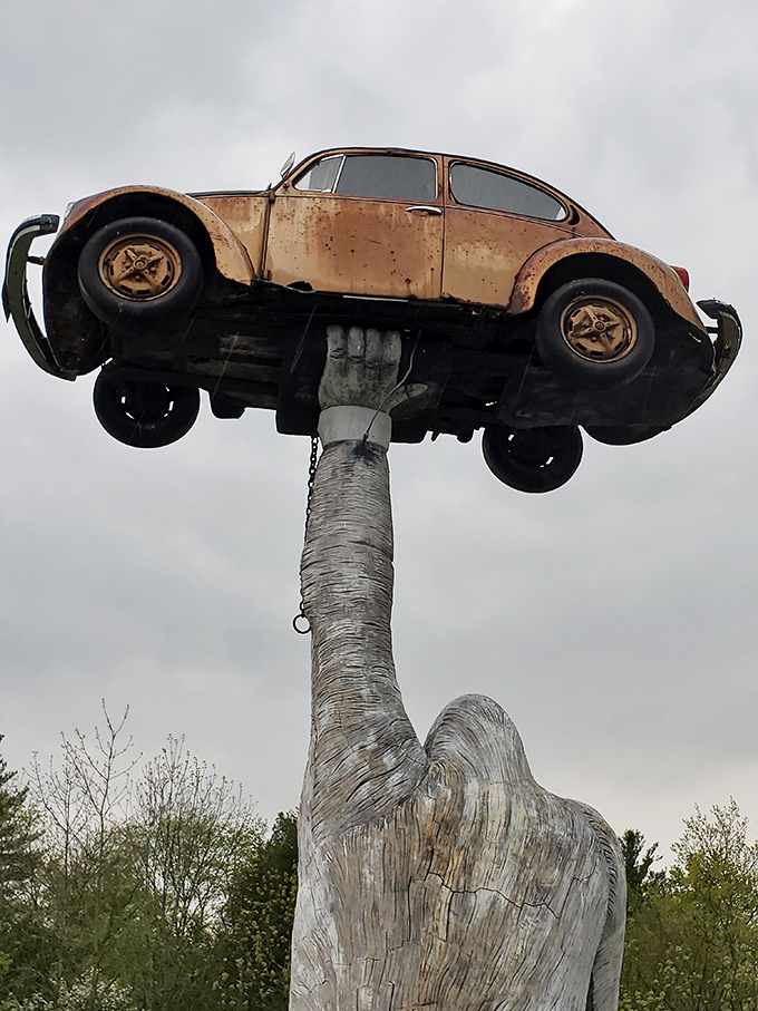 Autumn creates a spectacular backdrop for this unusual roadside attraction, where fall foliage meets concrete whimsy.