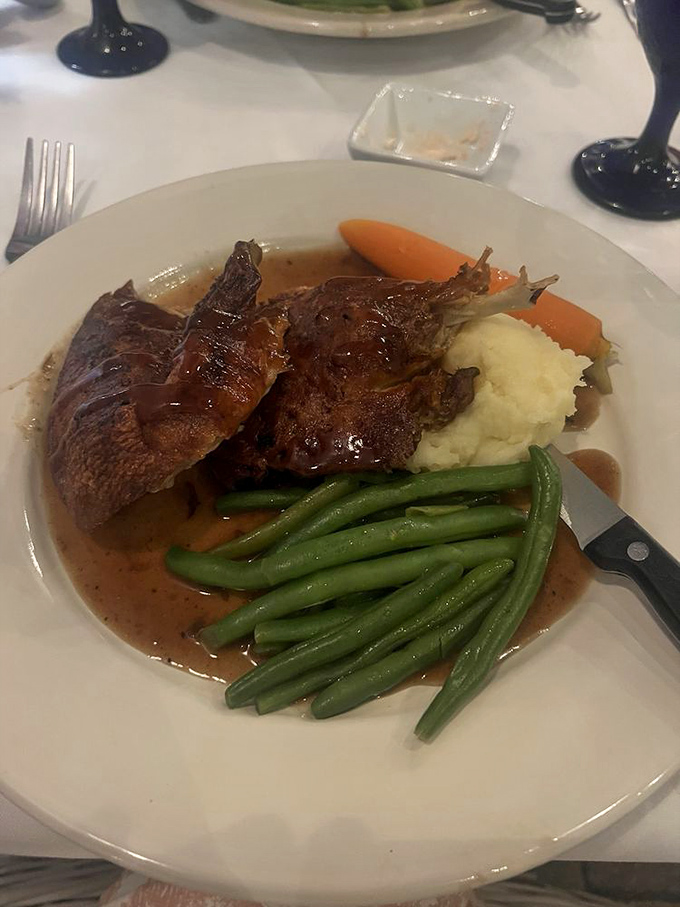 Caribbean Duck showcases the kitchen's versatility&mdash;crispy skin, tender meat, and a sauce that balances sweet and savory notes perfectly.