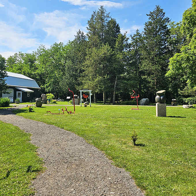 Charles Herndon's Sculpture Garden transforms stone into poetry, proving art and nature make the perfect island power couple.