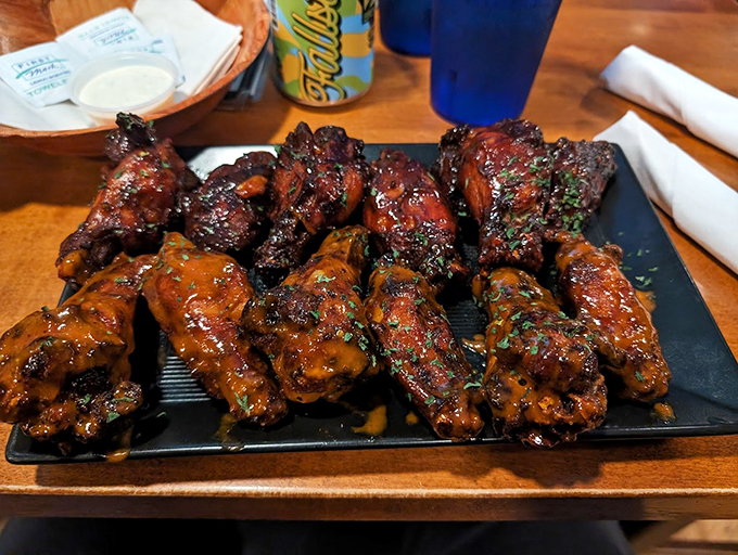 Saucy, smoky wings lined up like delicious dominoes, ready to start a flavor party in your mouth.