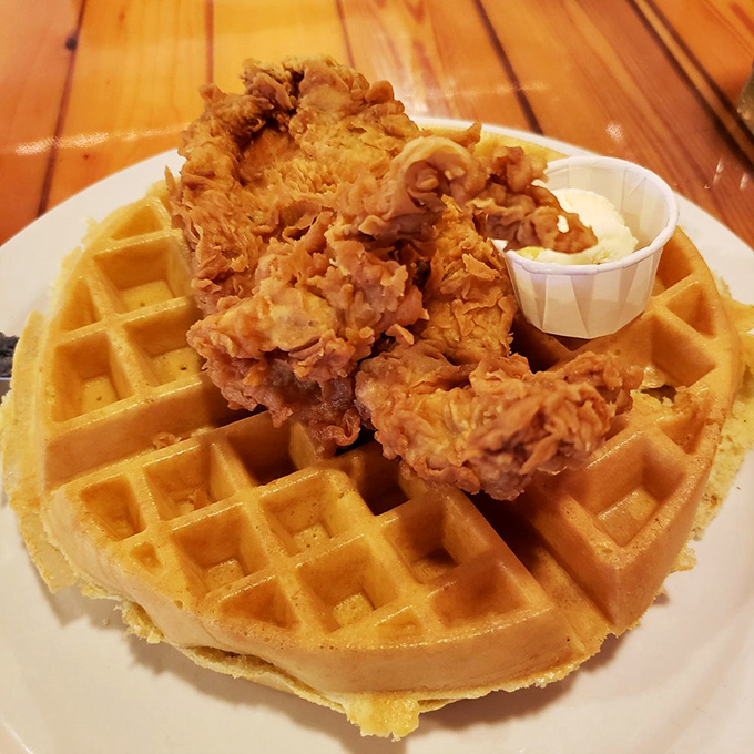 Golden-brown chicken perched atop a perfectly crisp waffle &ndash; the sweet-savory combination that proves breakfast and lunch boundaries were made to be broken.