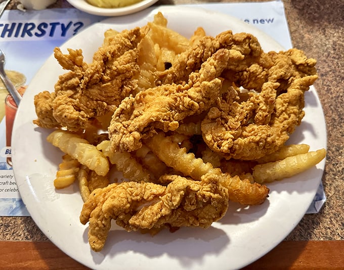 Fried chicken tenders and crinkle fries that transport you straight back to the best parts of childhood, only better because someone else cooked it.