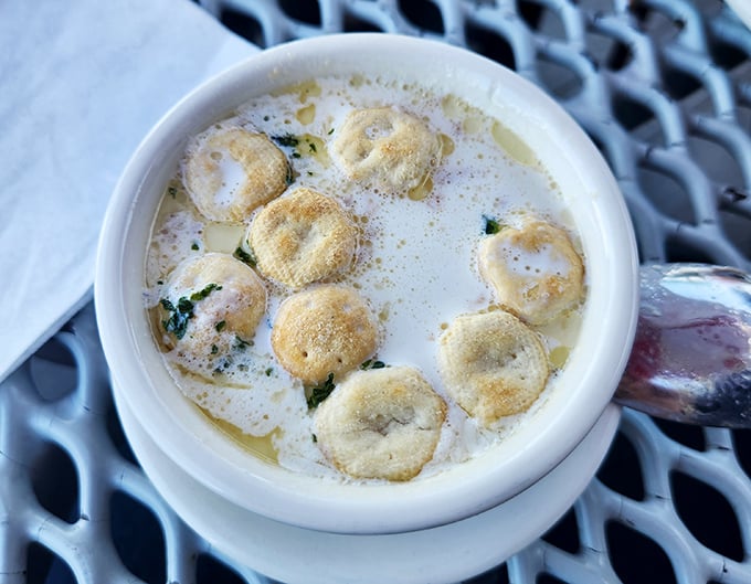 New England clam chowder so authentic it practically speaks with a Down East accent - creamy, briny perfection in every spoonful.