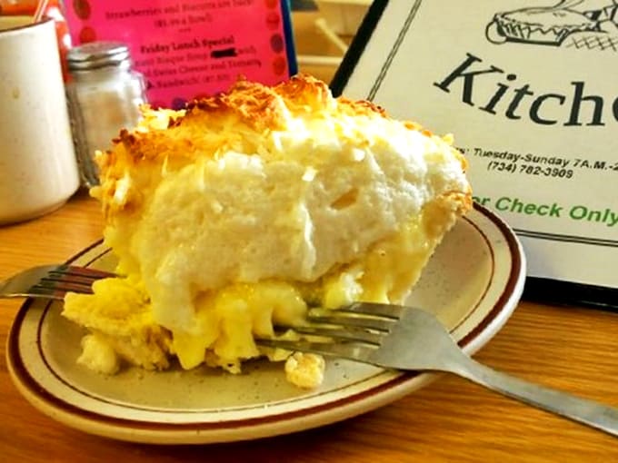 Toasted coconut flakes crown a dreamy white landscape of cream that somehow makes everything else in life temporarily irrelevant.