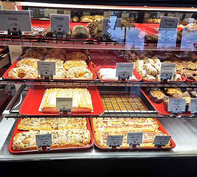 Sheet cakes lined up like edible soldiers, each one ready to make someone's celebration absolutely unforgettable.