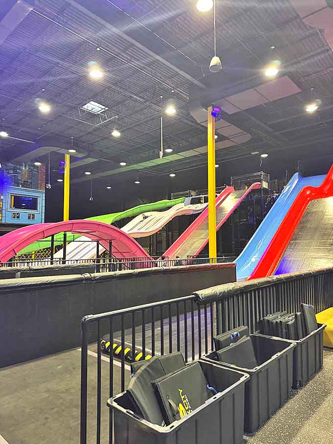 A kaleidoscope of slides creates a playground symphony of colors, each one promising a different flavor of adrenaline rush.